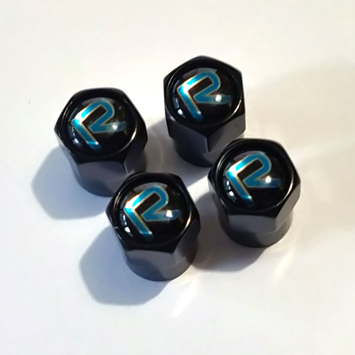 R Black Metal Wheel Dust Caps – Swedish Boost Mafia